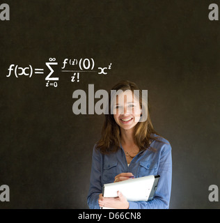 Young male math teacher in classroom Stock Photo - Alamy