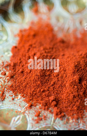 Ground paprika powder top view isolated on white Stock Photo - Alamy