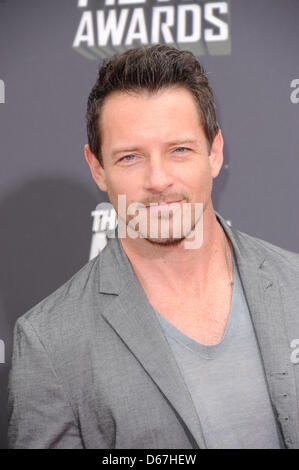 Ian Bohen arrives at The Los Angeles red carpet premiere for TEEN WOLF ...