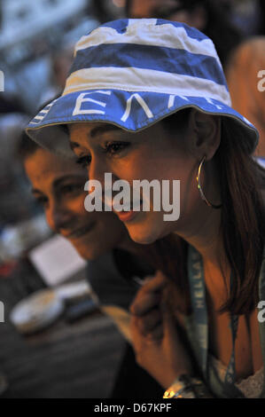 Greek soccer fans watch the UEFA EURO 2012 quarter final soccer match ...
