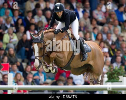 Swiss show jumper Janika Sprunger on Palloubet d'Halong jumps during ...