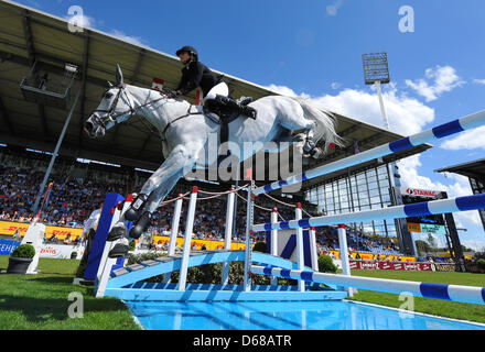 Swiss show jumper Janika Sprunger on her horse Palloubet d'Halong in ...