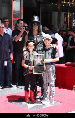 US musician Slash (back ) poses with his sons Cash (front, L) and ...