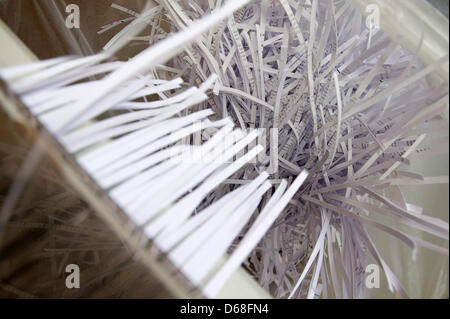 ILLUSTRATION - An illustrated picture shows documents being shredded in ...