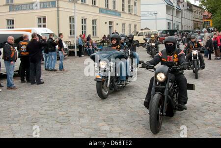 Members of motorcycle club 'Bandidos Germany' pictured in the court ...