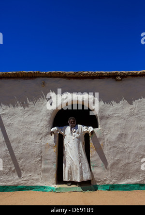 Sudan, Sahara Desert, A Nubian man displays his sword at an oasis in ...
