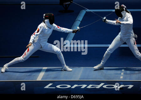 Germany's Imke Duplitzer (R) competes with China's Yujie Sun during the ...