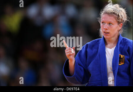 Germany's judoka Kerstin Thiele celebrates after winning her fight ...