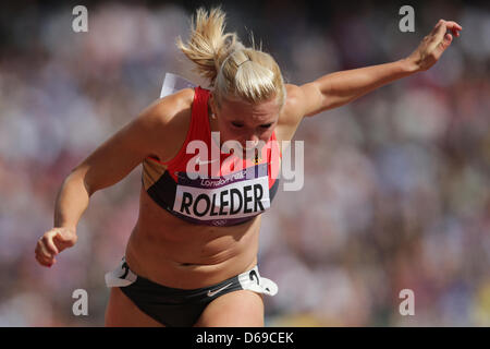 Cindy Roleder of Germany competes during Women's 100m Hurdles Round 1 ...