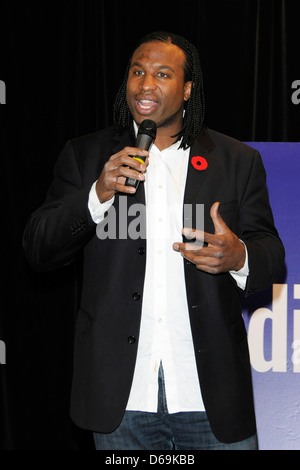 Former NHL player, Georges Laraque, signs his latest book 'The Story of ...