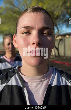 Inmates of the female chain gang line up ready to enter Estrella Jail ...