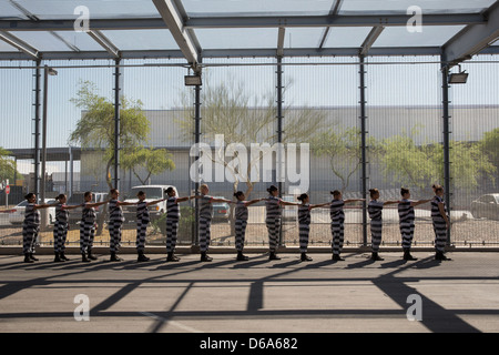 Female inmates stand in line Stock Photo - Alamy