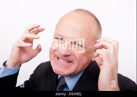 Portrait of angry man gritting teeth in business suit, frustrated and ...