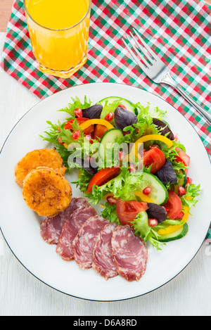 fresh salad with tomatoes, cucumbers, herbs and hemp seeds Stock Photo ...