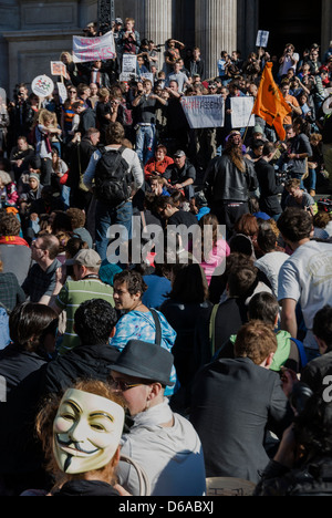 Protesters are wearing V For Vendetta mask at Occupy London Stock Stock ...