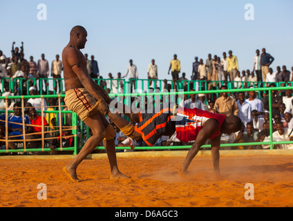 Nuba wrestling, Spectator Stock Photo - Alamy