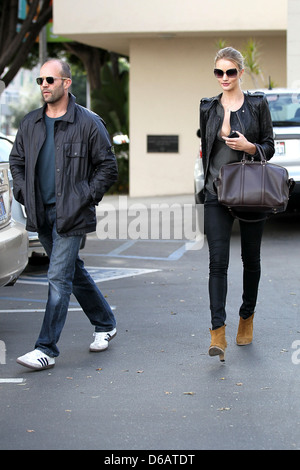 Actor Jason Statham and girlfriend Rosie Huntington-Whiteley arrive at ...