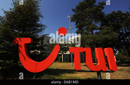 The Tui logo stands in front of the headquarters of Tui tour operators ...