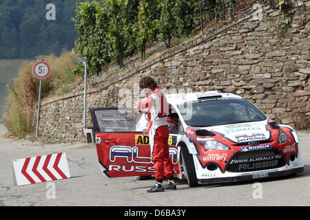 Russian rally driver Evgeny Novikov and his Austrian co-driver Ilka ...