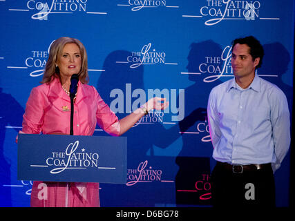 Ann Romney, left, thanks her youngest son, Craig, right, for his ...