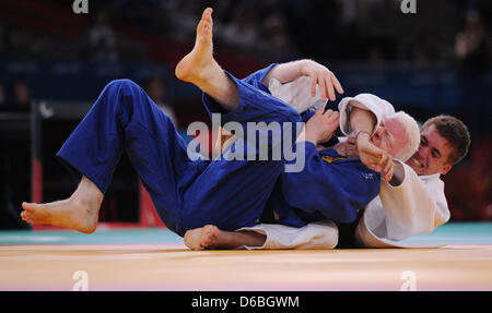 Matthias Krieger (blue) of Germany and Dan Powell of Great Britian ...
