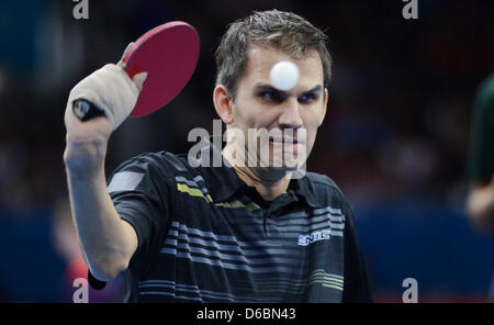 Holger Nikelis of Germany and Ducay (not seen) of France compete during ...