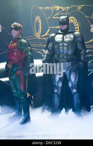 Kamran Darabi-Ford as Robin (L) and Sam Heughan as Batman are pictured ...