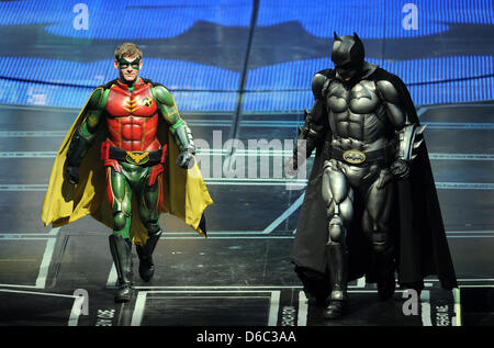 Sam Heughan (R) as Batman and Kamran Darabi-Ford als Robin pose during ...