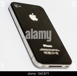 Apple logo on back of Iphone 5S in pocket of red jacket Stock Photo - Alamy
