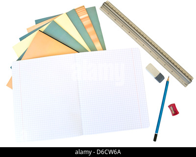 Notebooks, pencil, eraser, ruler and sharpener at the white table Stock ...