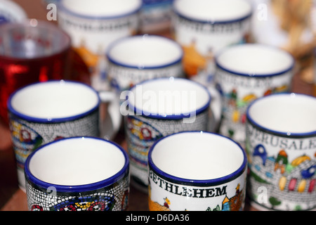 Ceramic mugs on color background Stock Photo - Alamy