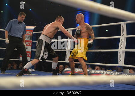 Spanish cruiserweight boxer David Quinonero (L) fights with Polish ...
