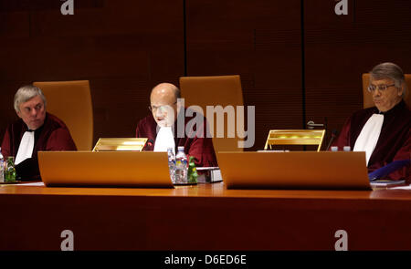 Presiding judge Koen Lenaerts (C) and judges Jiri Malenovsky (L) and ...