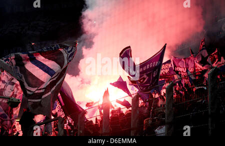 Supporters of Hamburger SV use pyrotechnics during the second ...
