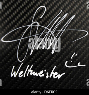 An autograph, a smiley and the word "Weltmeister" (World Champion ...