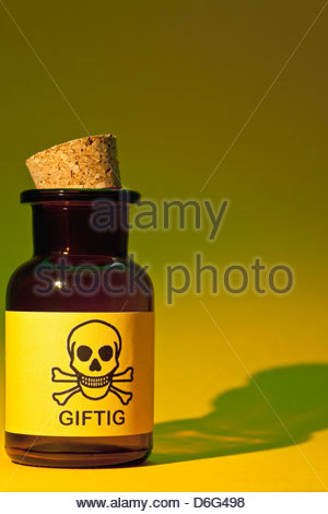 Bottle of poison with skull and crossbones warning sign on label Stock ...
