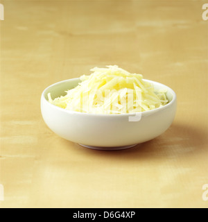 Bowl of grated cheese Stock Photo - Alamy