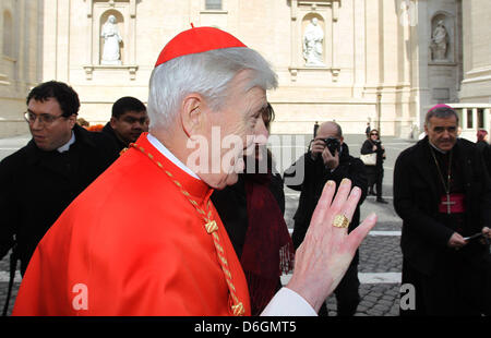 Berlin Archbishop Karl Josef Becker (L) receives his certificate of ...