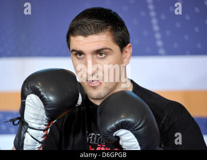 German heavyweight boxer Marco Huck shows his fists in Stuttgart ...
