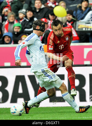 Bayern Munich?s Ivica Olic (L) vies for the ball with Wolfsburg?s ...