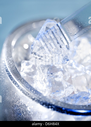 A Cold carbonated drink with ice cubes and Cracker Biscuit isolated on ...