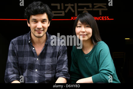 Hyun Wanner (L) and Young-Mi Park-Snowden sit in front of their ...