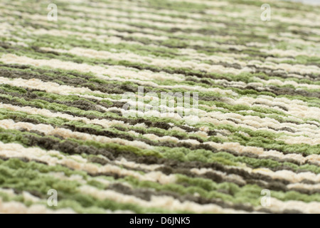 Close up of green doormat texture surface Stock Photo - Alamy