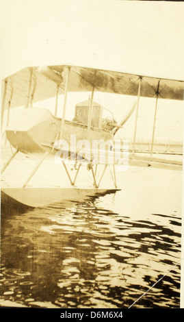 This historical photo features a Burgess-Dunne biplane, a pioneering ...