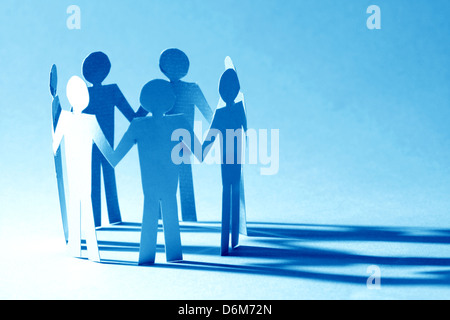 paper team linked together partnership concept Stock Photo - Alamy