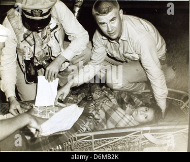 This image shows first aid being administered to U.S. soldiers at the ...