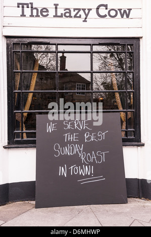 Sunday roast sign outside pub, High Street, Brentford, London Borough ...