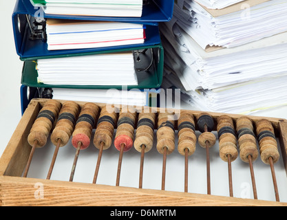 Old mathematical calculator abacus with bunch of papers Stock Photo - Alamy