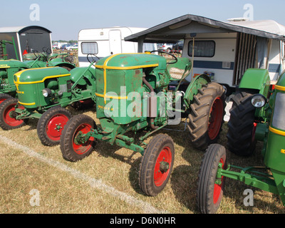 Green Deutz with red wheels Stock Photo - Alamy