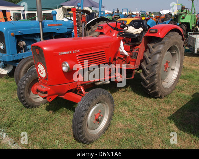 The Red Guldner is a classic German tractor known for its robust design ...